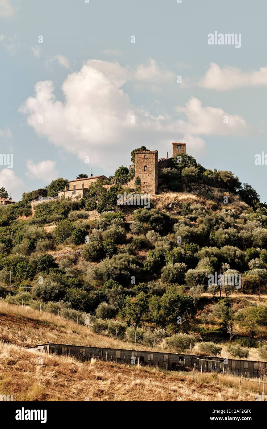 The medieval tower fortifications of the hilltop village of ...
