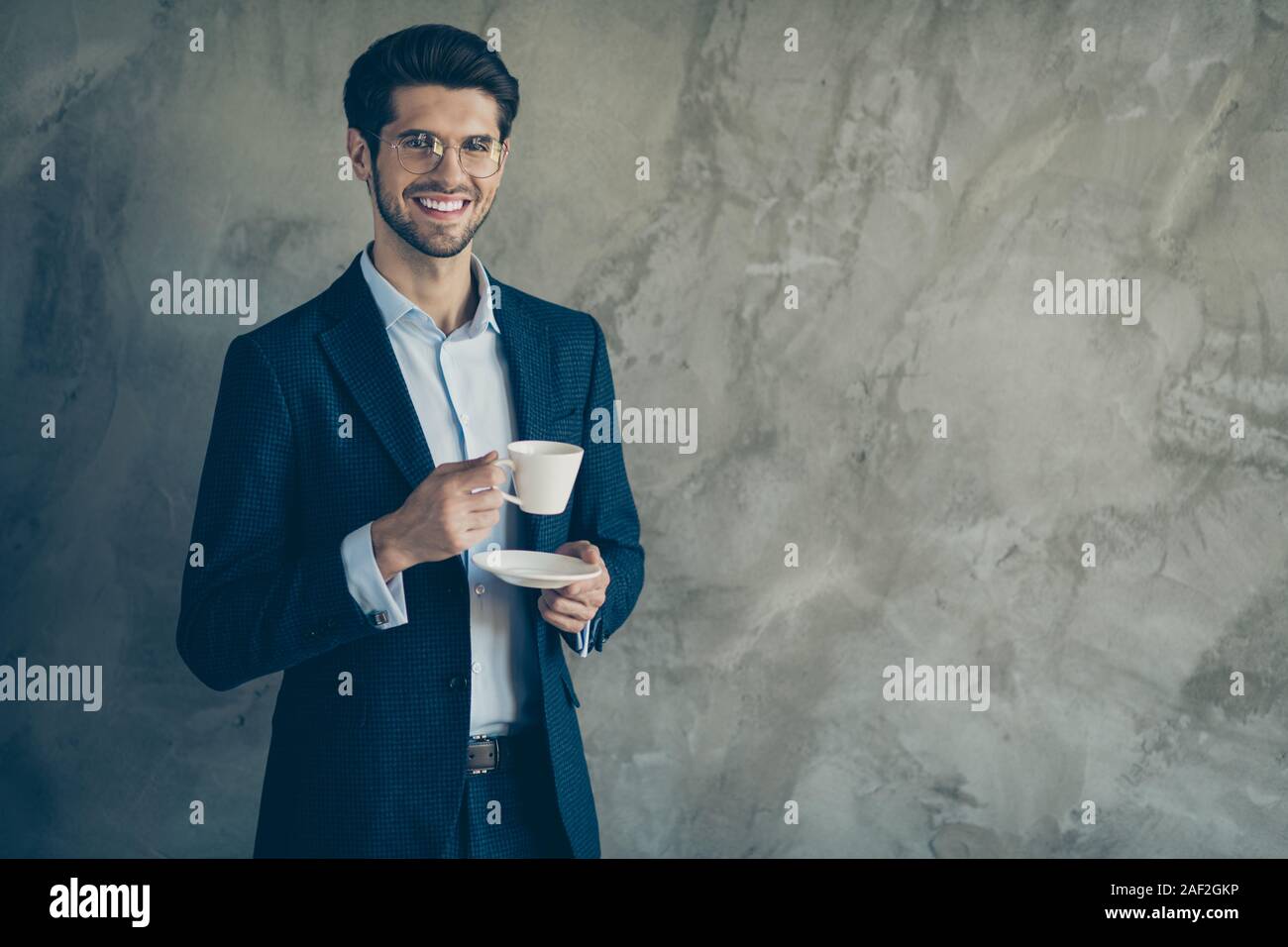 Portrait of positive attractive guy rich wealthy entrepreneur have rest ...