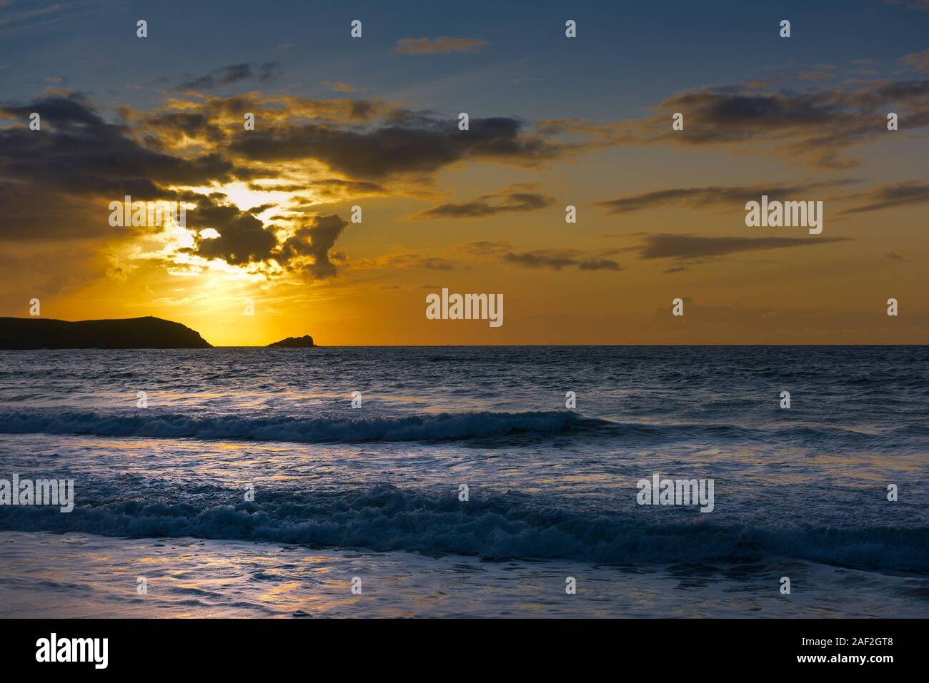 A beautiful intense sunset over Fistral Bay in Newquay in Cornwall ...