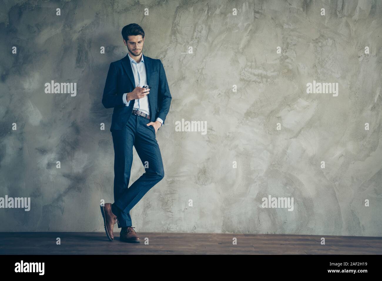 Full length body size photo of focused man in searching for necessary ...