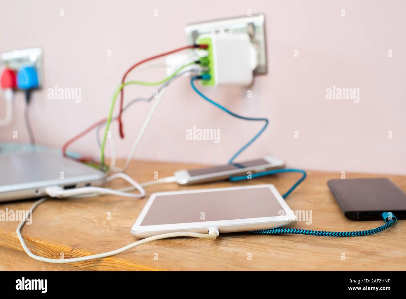 Selection Of Mobile Phones Digital Tablet And Laptop Computer Being ...