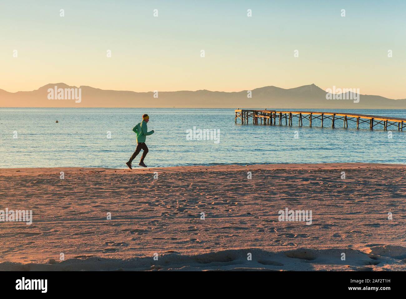 Athlete run on the morning beach. Sport photo in beautiful nature Stock ...