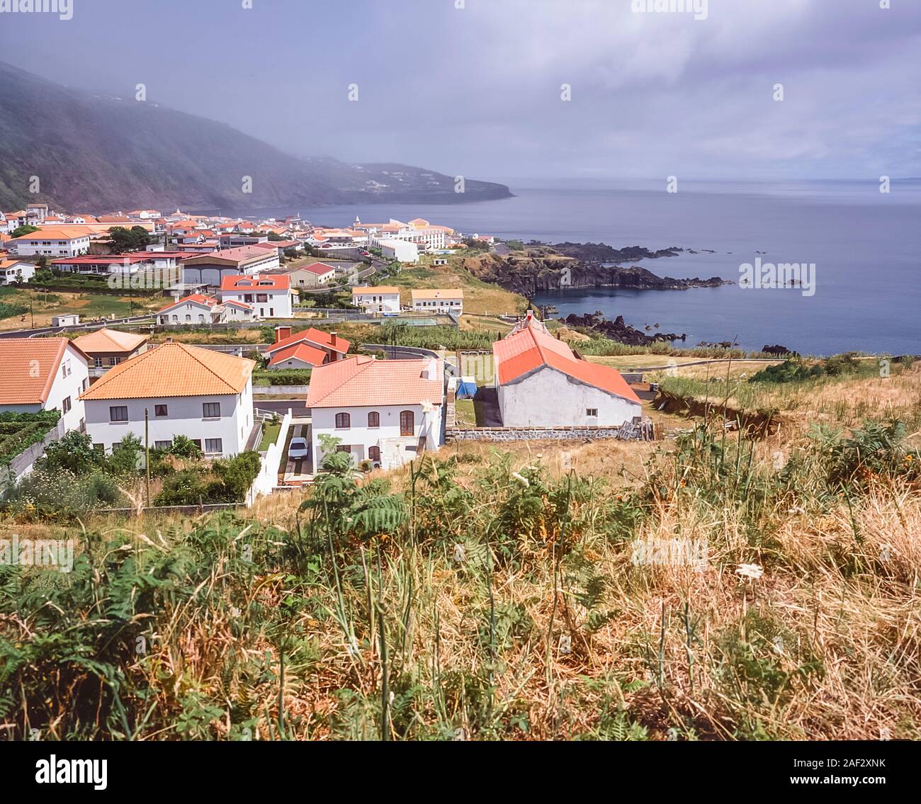 The colourful island of Sao Jorge [St George] and town of Velas in the ...