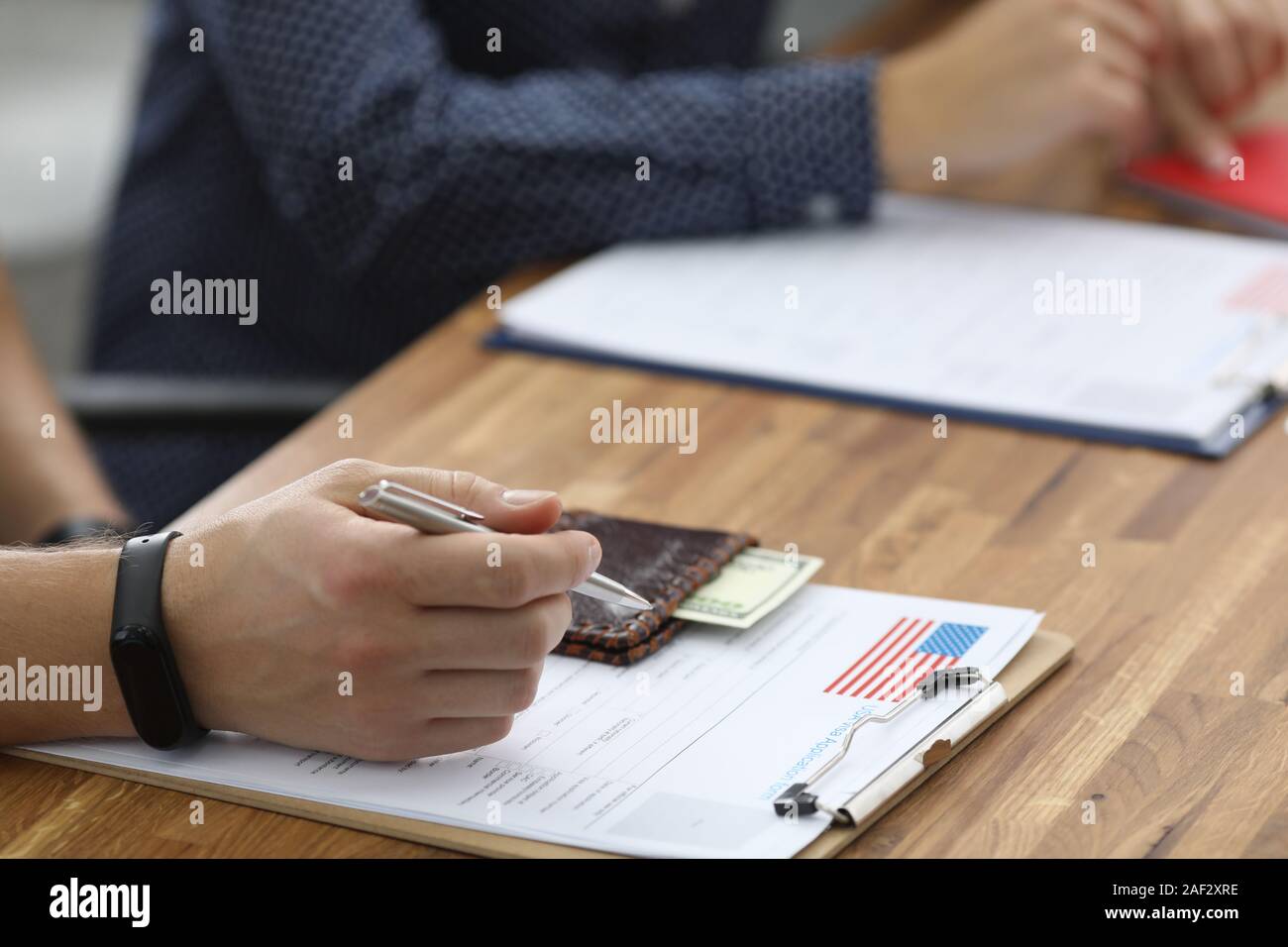 Entry paper at embassy Stock Photo - Alamy