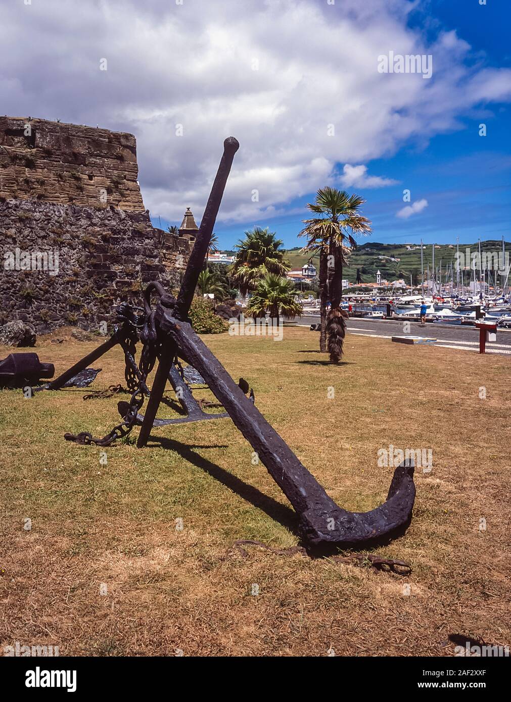 The colourful island of Faial with old ships anchors at the old ...