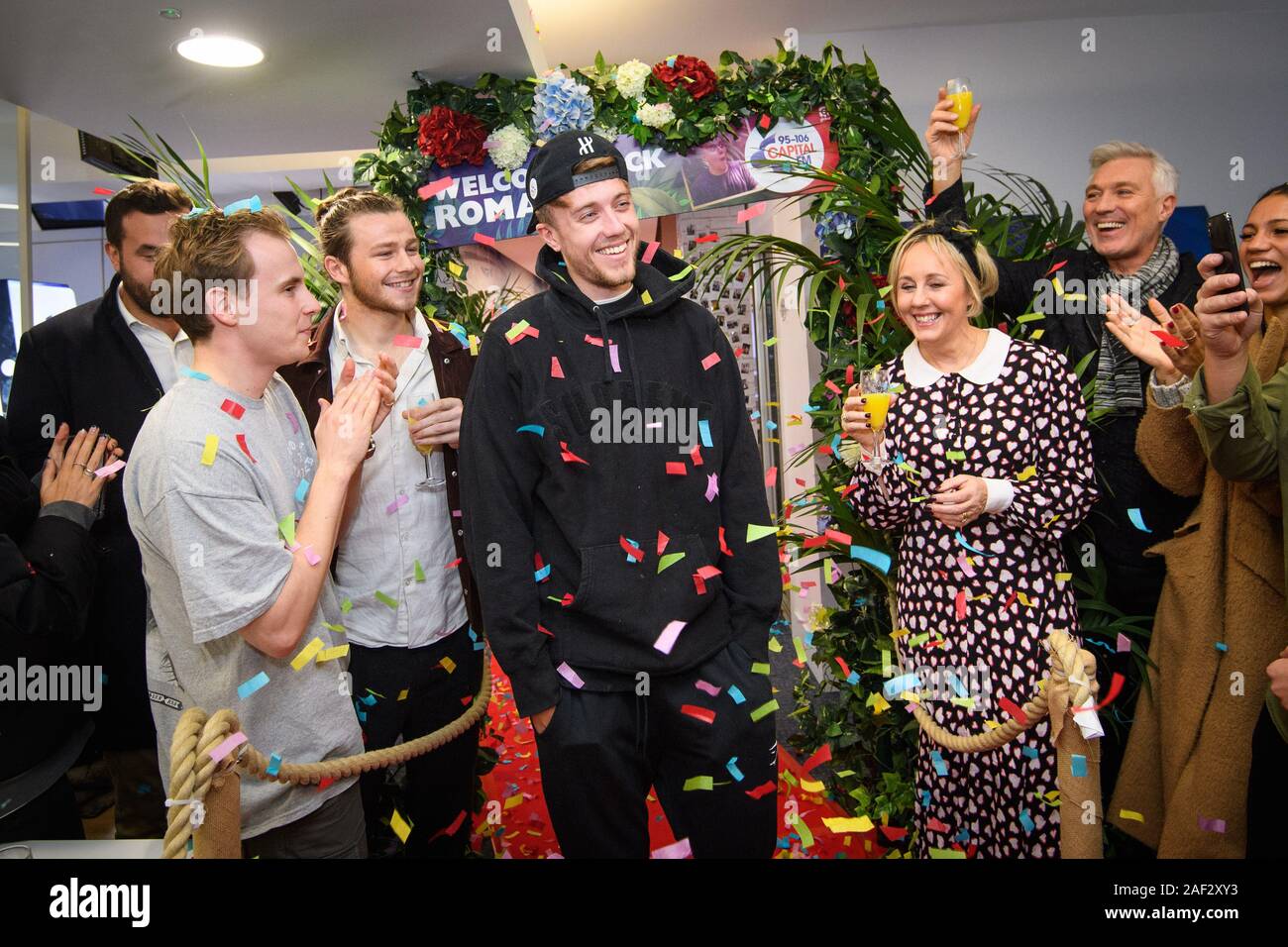 Roman Kemp is greeted by friends and family, including parents Shirlie ...