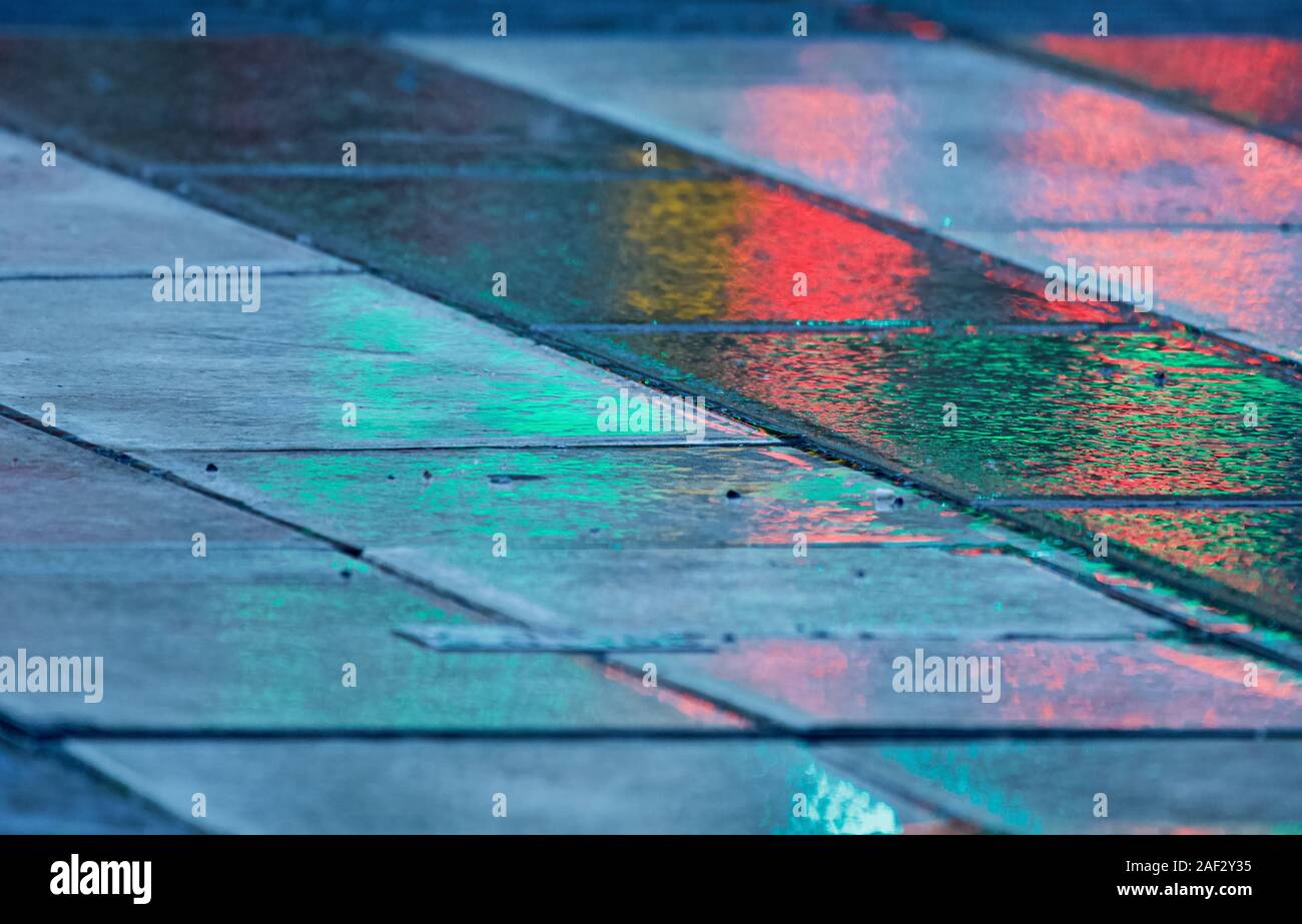 Street photo with reflections on a rainy day Stock Photo - Alamy