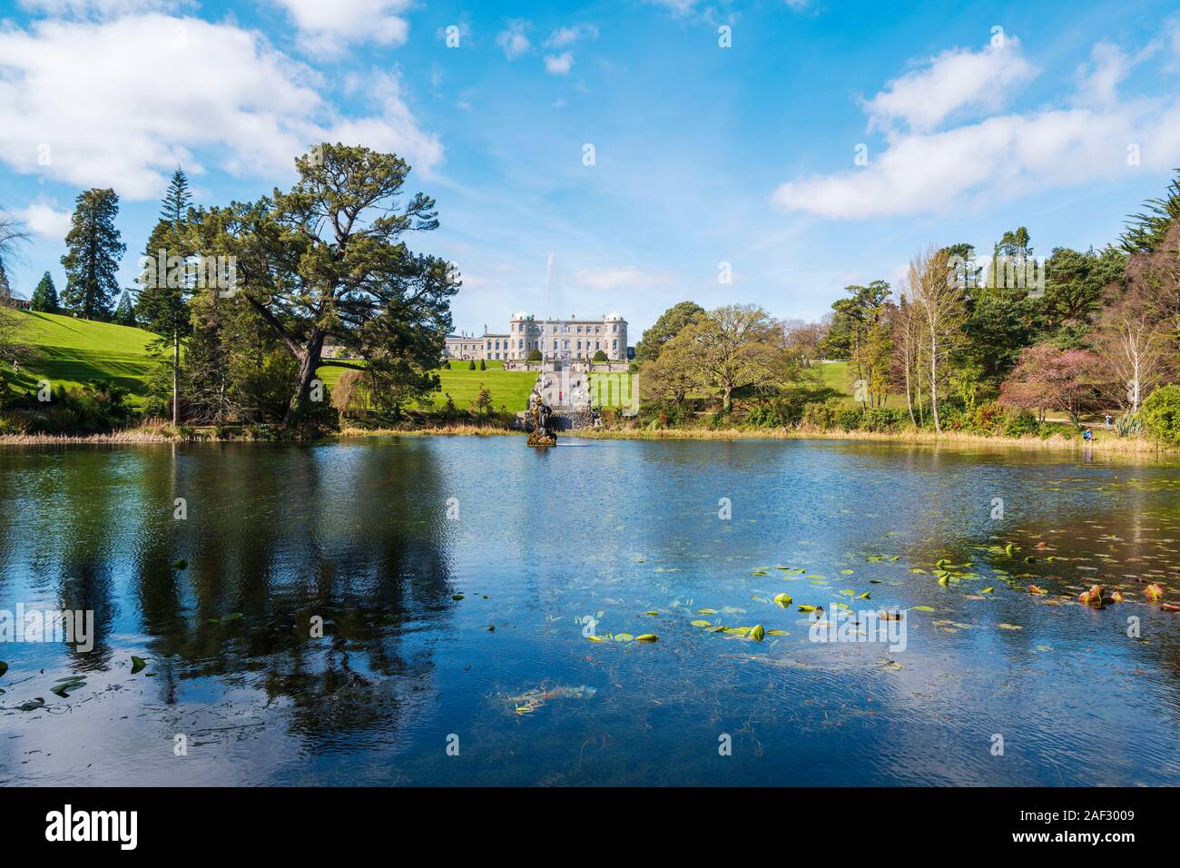 Image of an Irish mansion surrounded by gardens with a pond Stock Photo ...