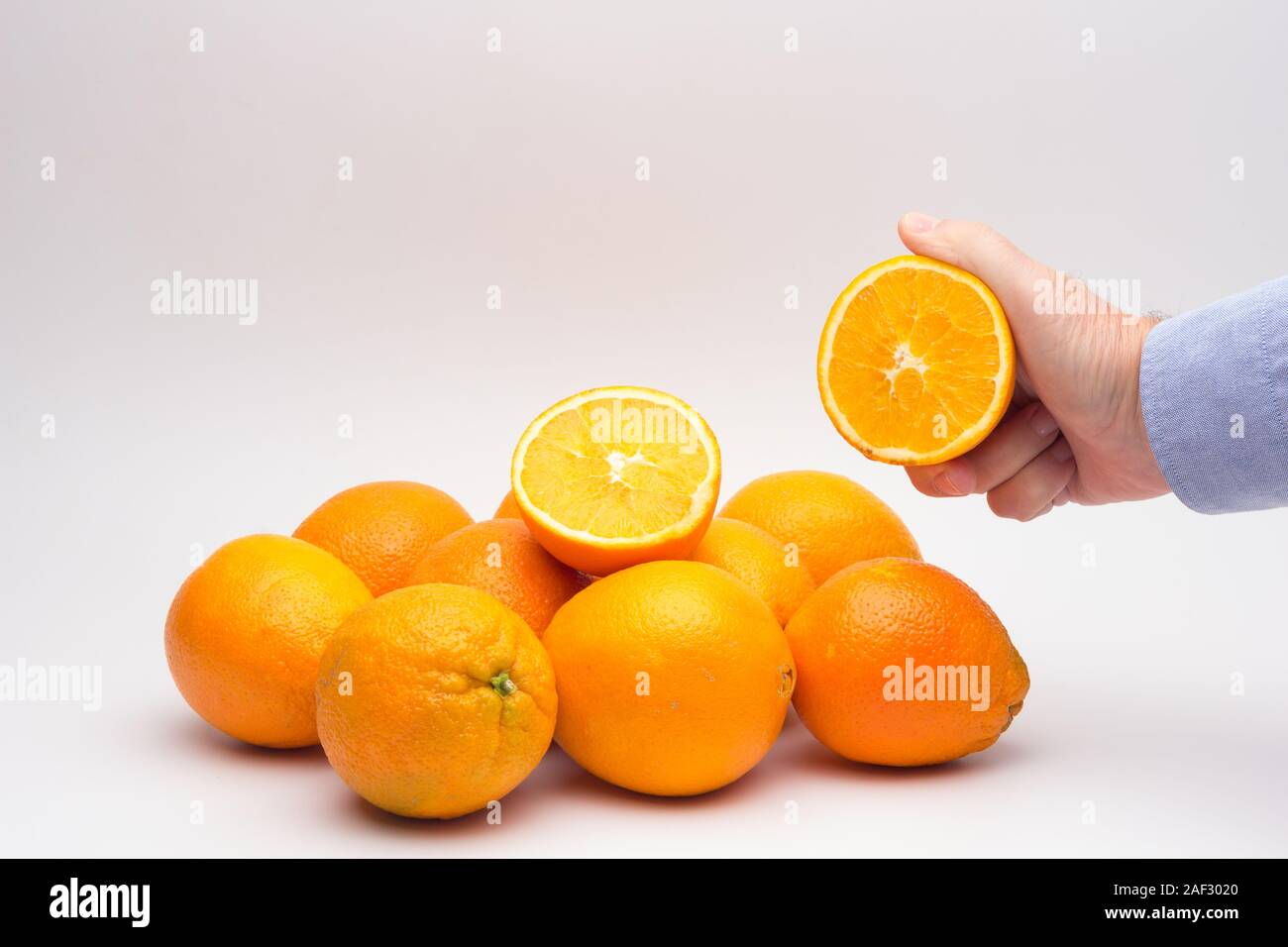 Orange is a fruit of a size that fits in the hand of an adult person ...