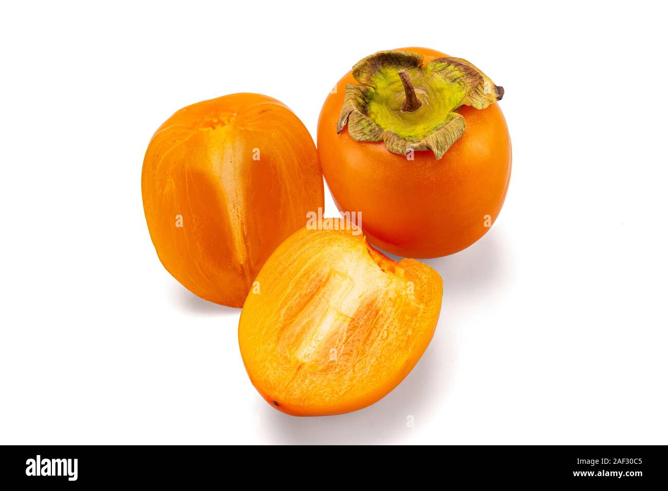 fresh ripe persimmons with leaf isolated on white background. full ...