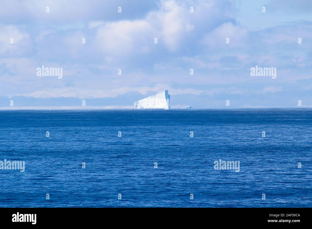 An iceberg among the islands around the Antarctic peninsula, Antarctica ...