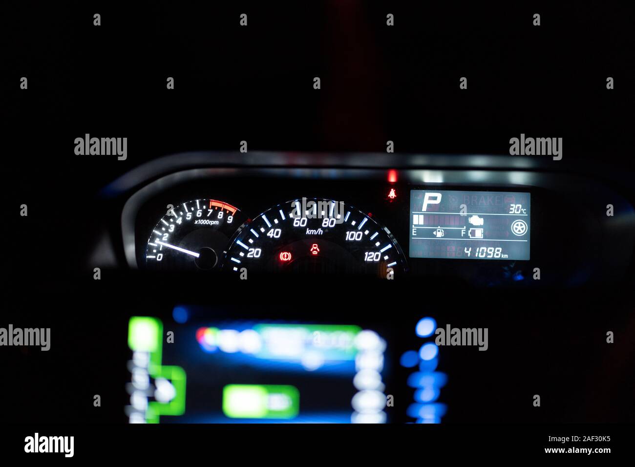 Modern car illuminated dashboard closeup Stock Photo - Alamy