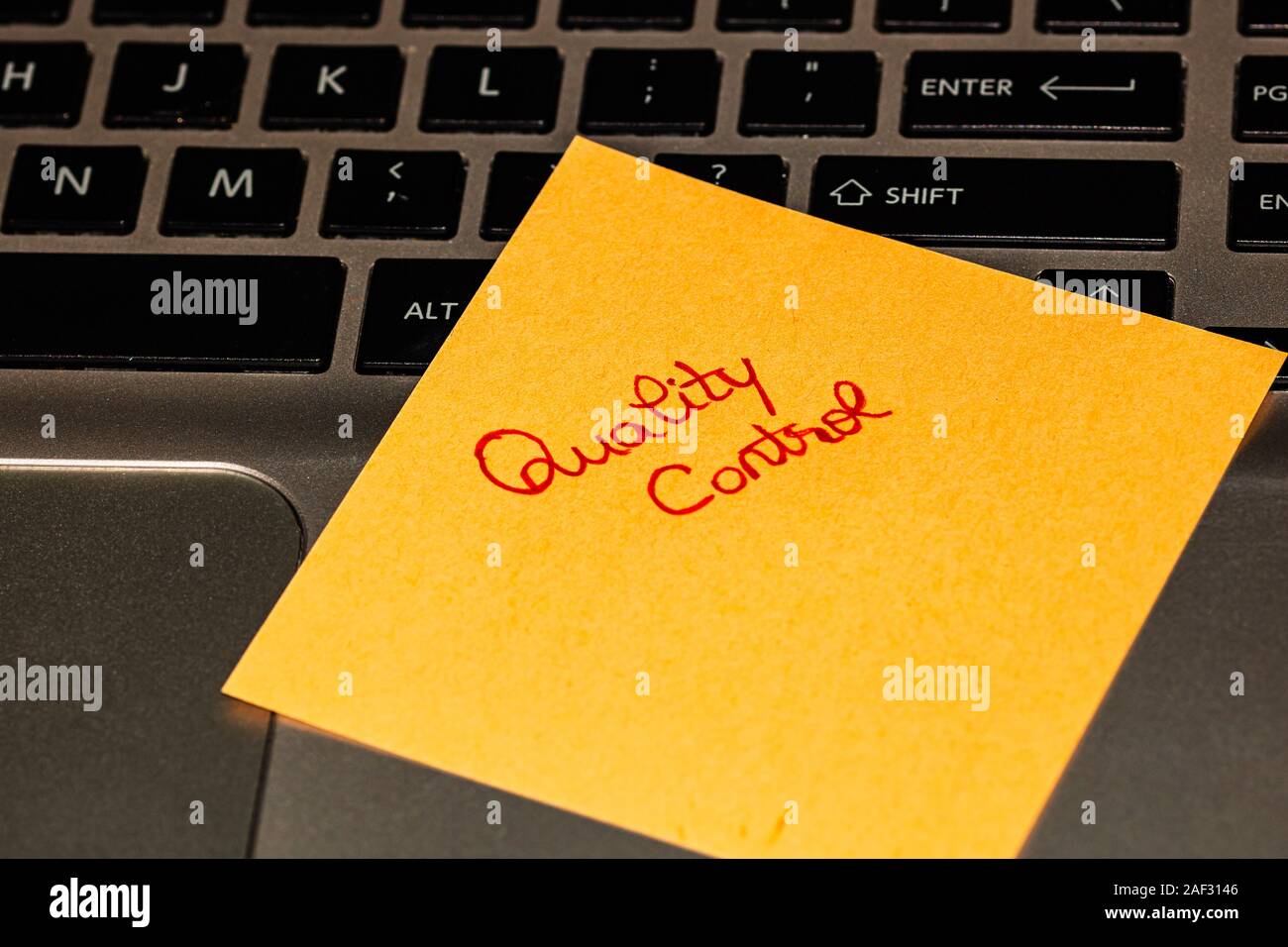 Writing on colorful sticky note Quality control. Text with Quality ...