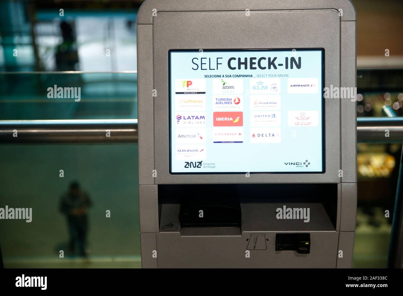 Self check-in terminal seen at Lisbon Portela Airport Stock Photo - Alamy