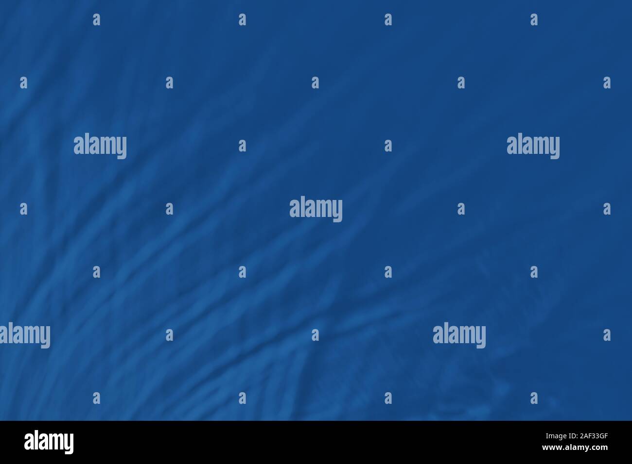 Trendy blue colored low contrast abstract background with light and ...