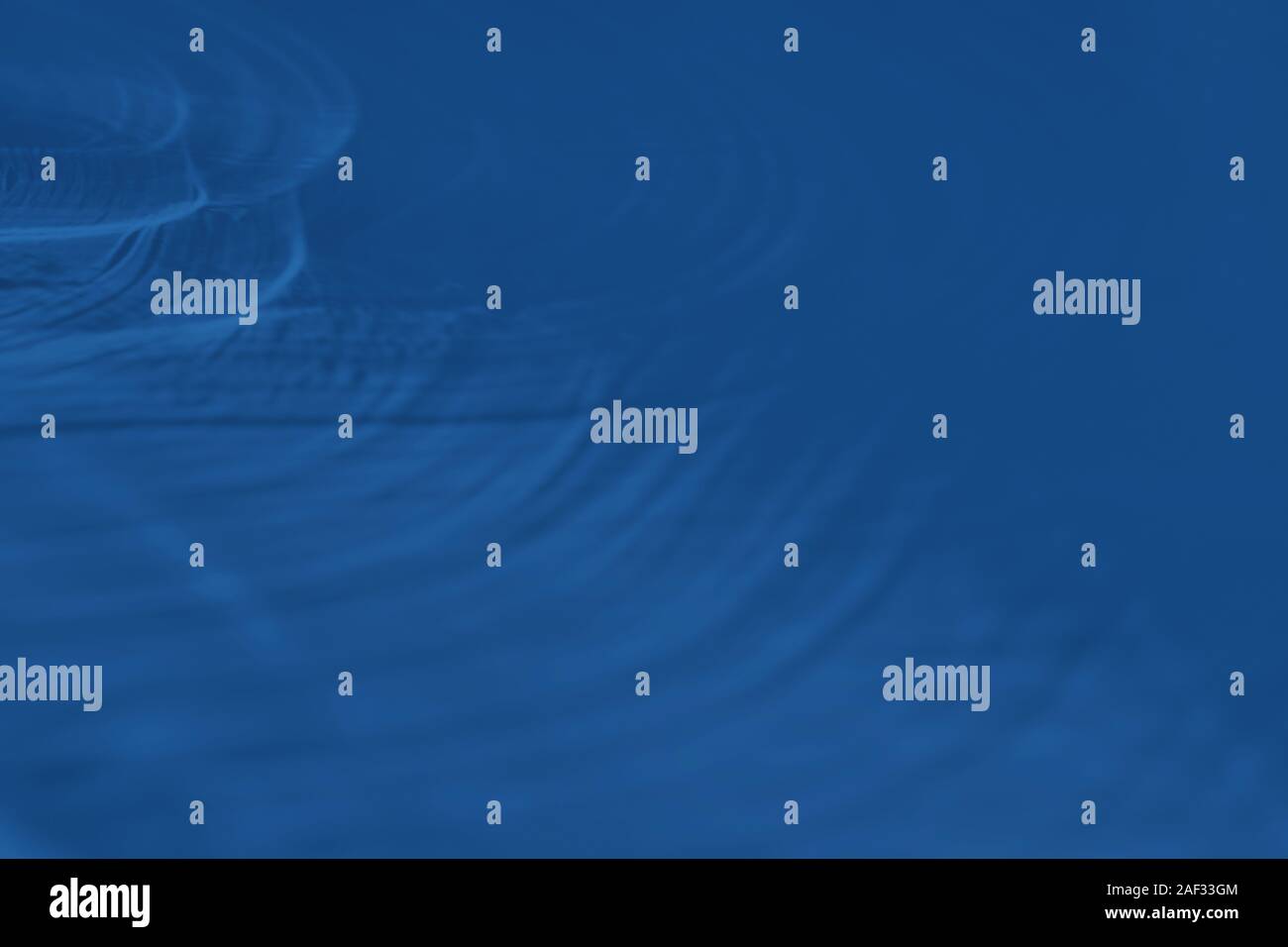 Trendy blue colored low contrast abstract background with light and ...