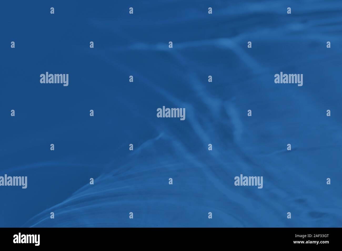 Trendy blue colored low contrast abstract background with light and ...