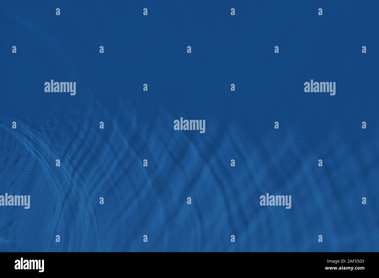 Trendy blue colored low contrast abstract background with light and ...