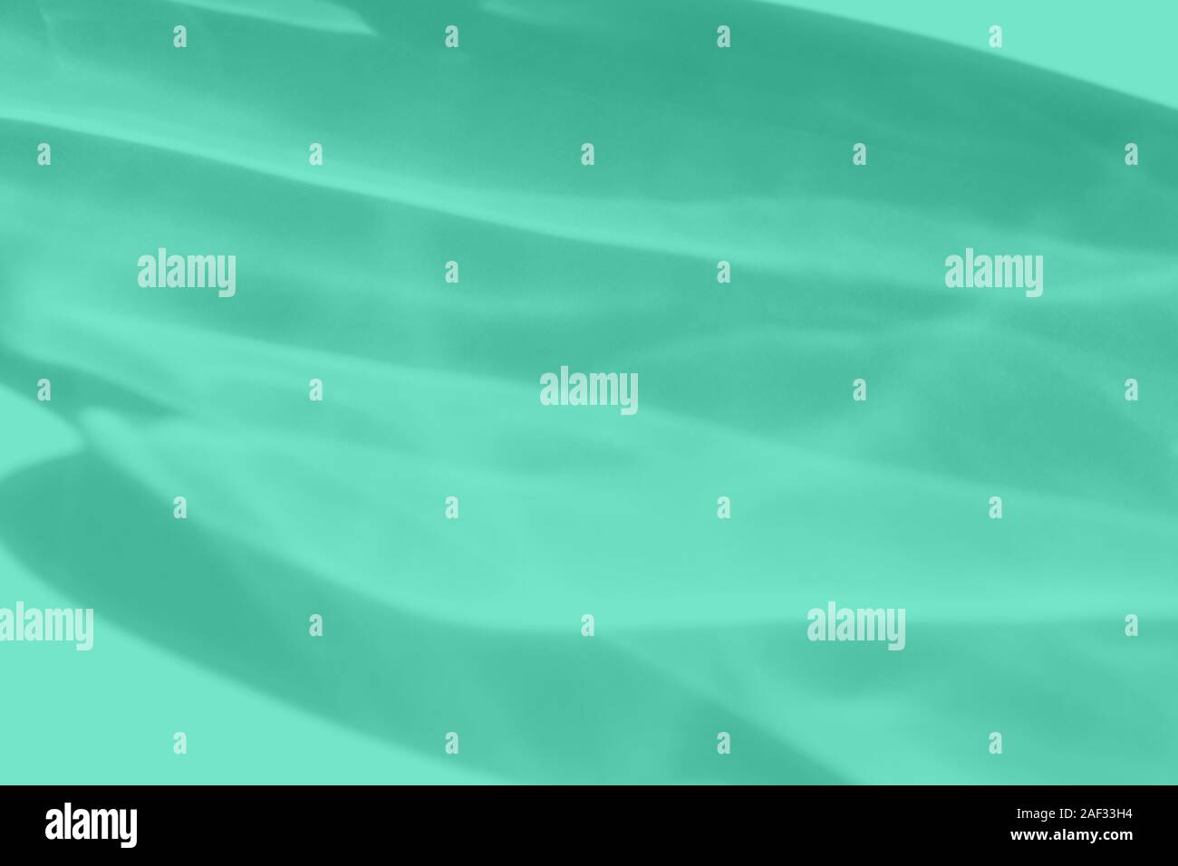 Trendy mint colored abstract background with light and shadows caustic ...