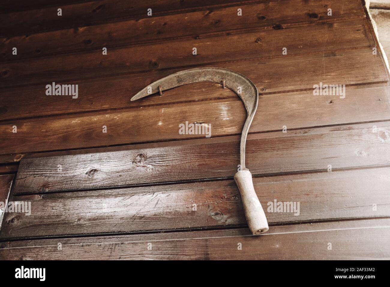Sickle wooden isolated hi-res stock photography and images - Alamy