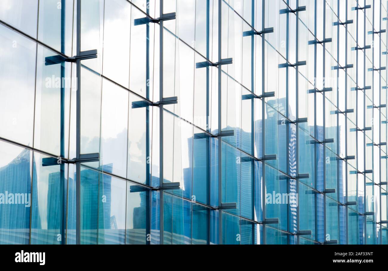 blue color glass building facade detail view Stock Photo - Alamy