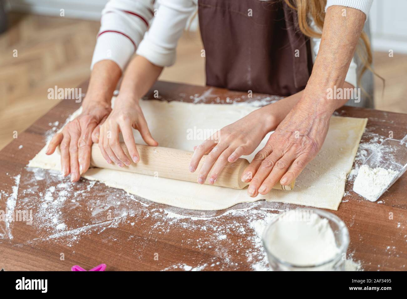 Two female cooks working in the kitchen Stock Photo - Alamy