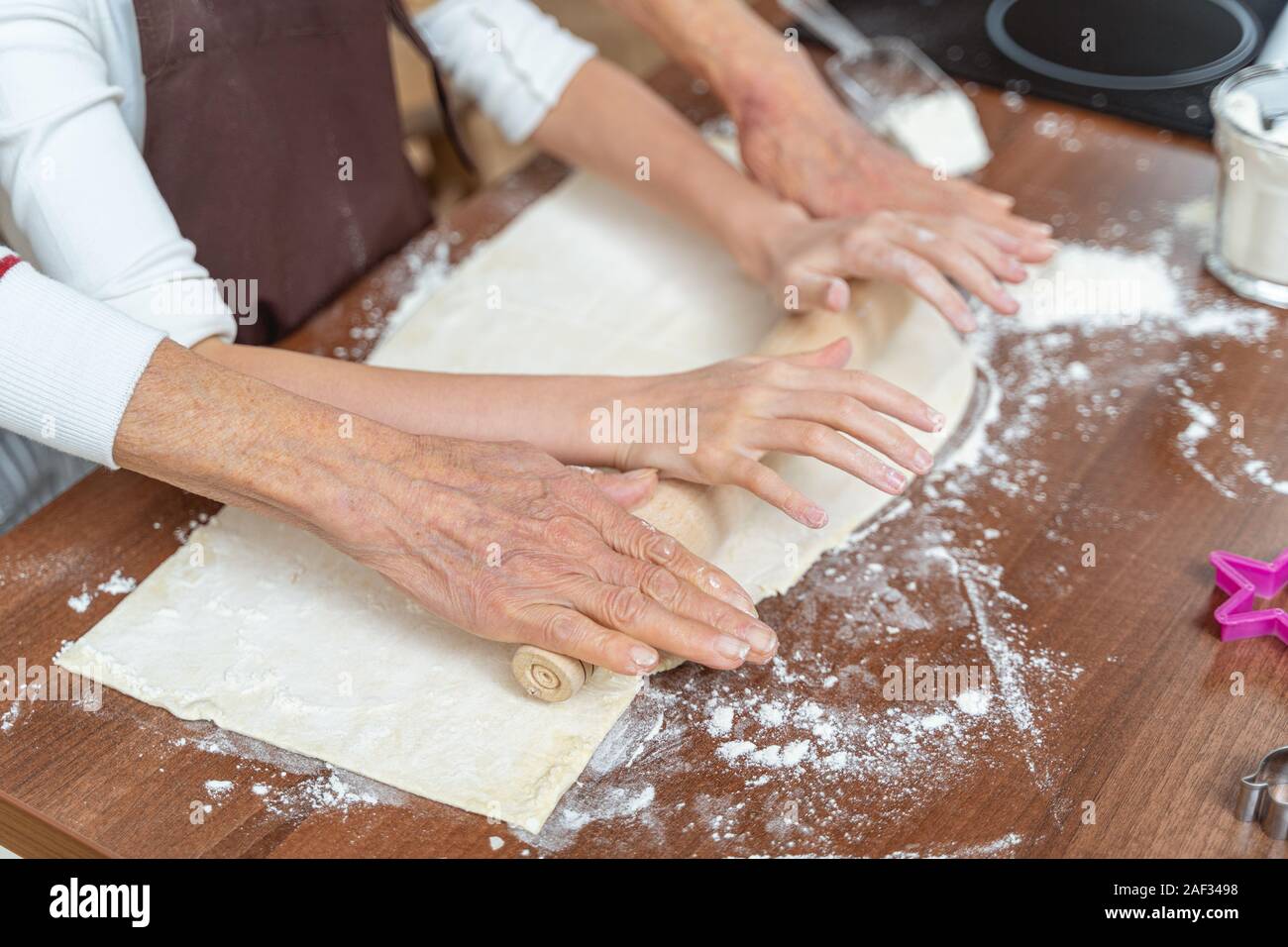 Lady rolling pastry hi-res stock photography and images - Alamy