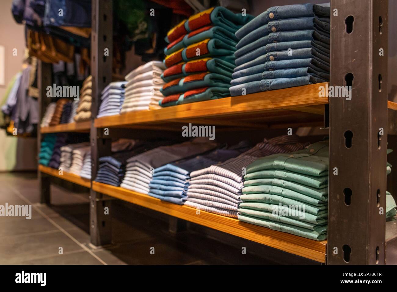 Stack of folded jeans on store shelves hi-res stock photography and ...