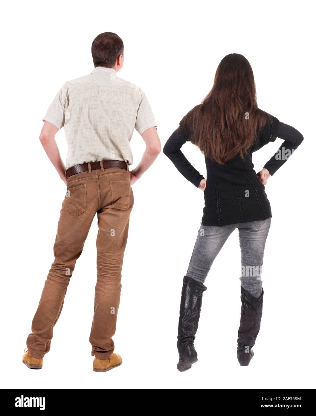 Back view of couple. beautiful friendly girl and guy together. Rear ...