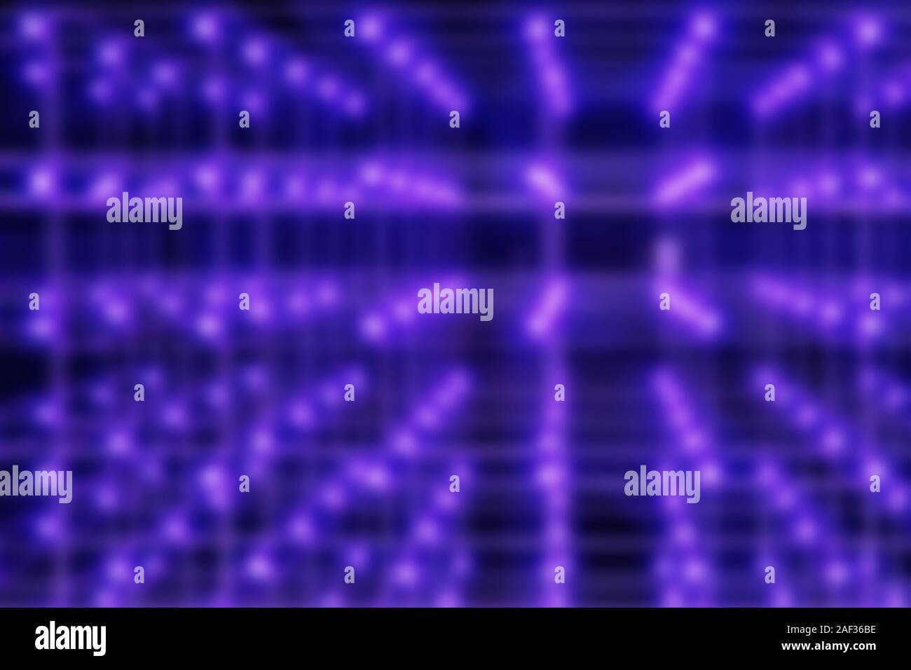 purple blurred fantastic background with perspective, light bulbs ...