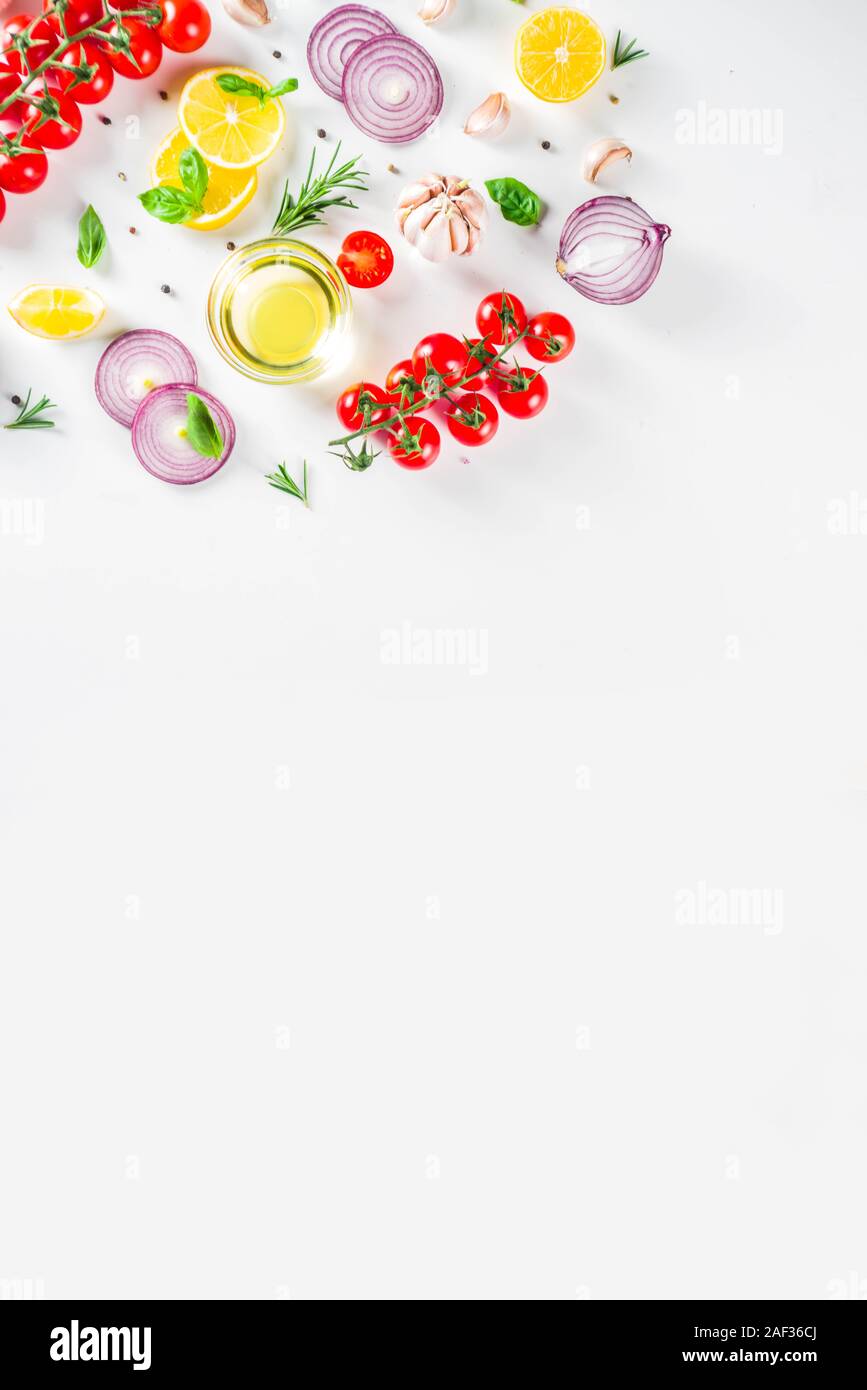 Cooking background with spices, vegetables and herbs fresh basil ...