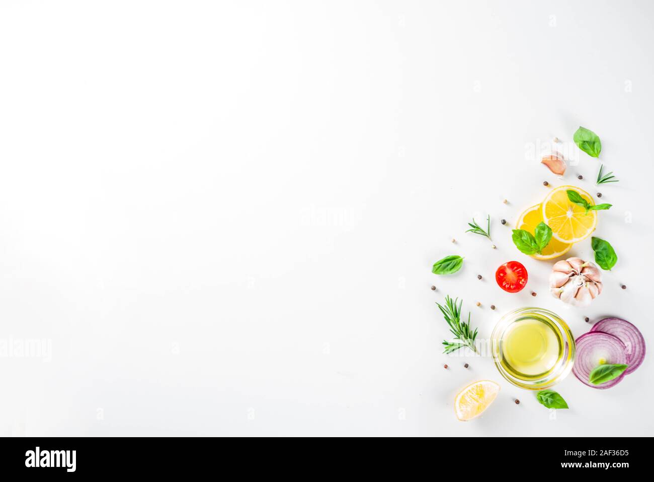 Cooking background with spices, vegetables and herbs fresh basil ...
