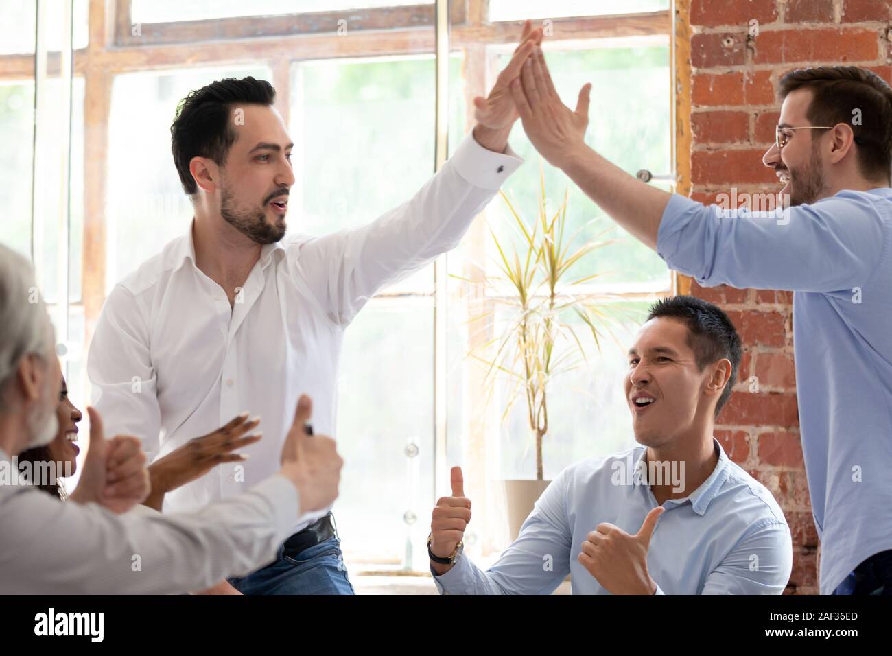 Team building trust teamwork unity hi-res stock photography and images ...