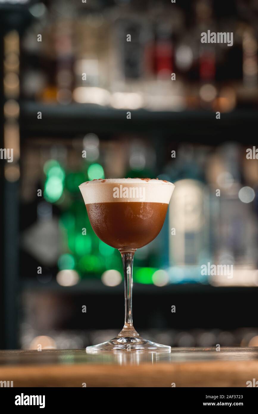 Espresso vodka cocktail on a bar desk Stock Photo - Alamy