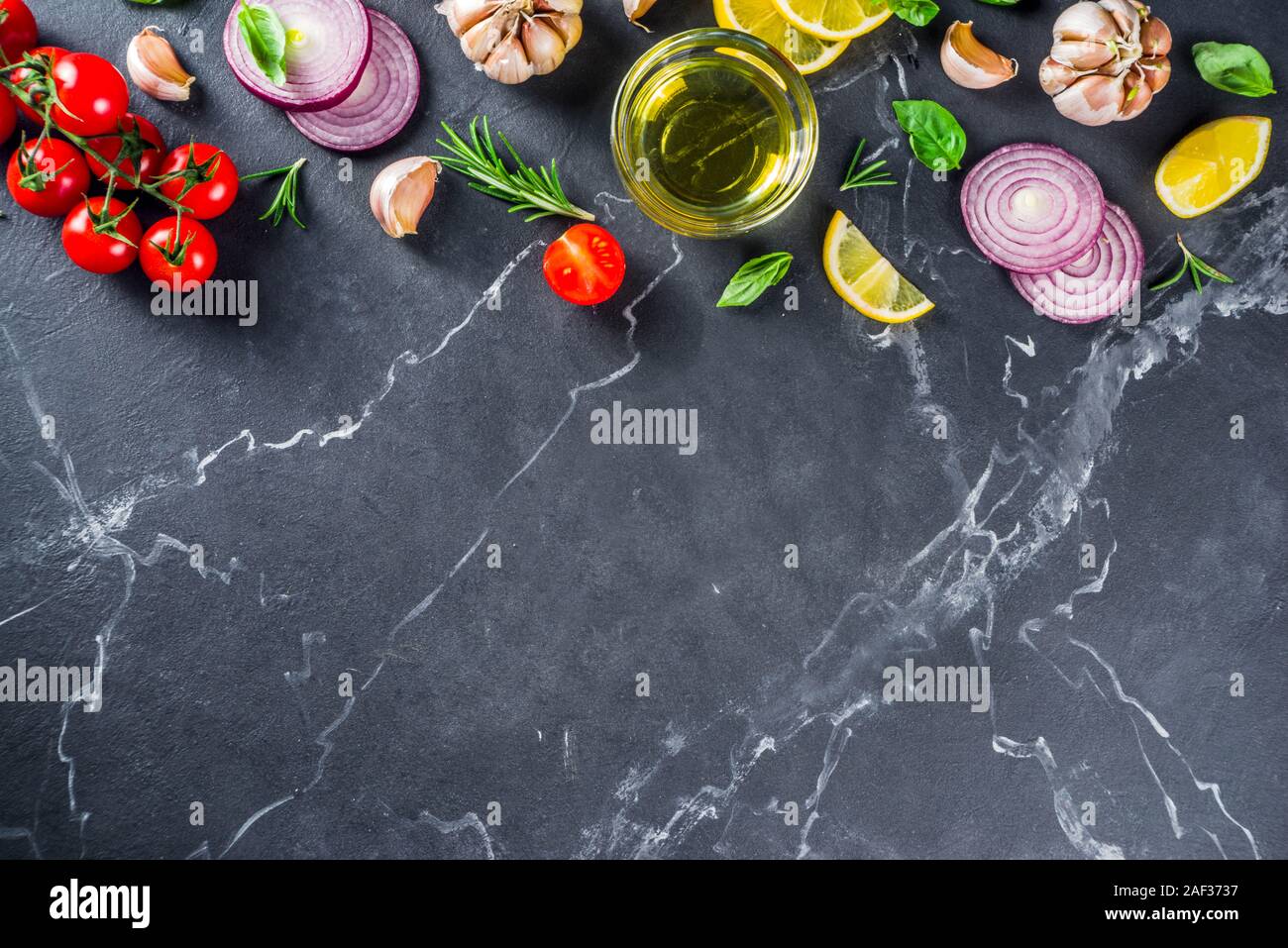 Cooking background with spices, vegetables and herbs fresh basil ...