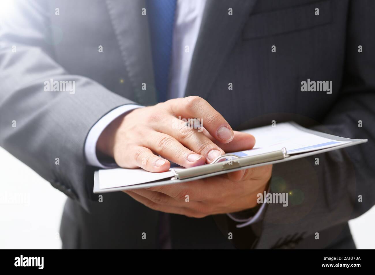 Male arm in suit and tie fill form clipped Stock Photo - Alamy