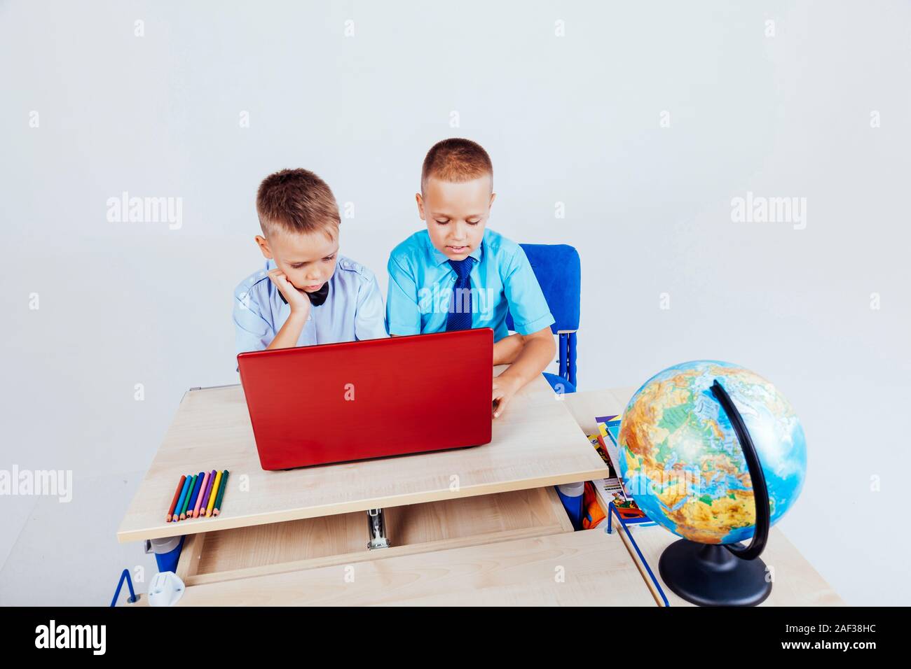 boys at a computer on the Internet school lessons Stock Photo - Alamy