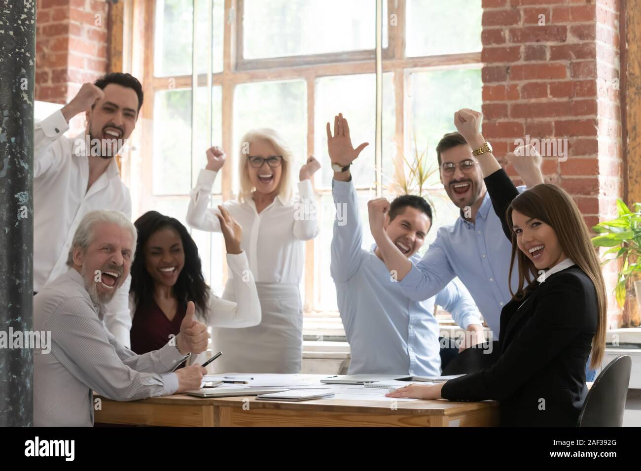 Excited celebrating hi-res stock photography and images - Alamy