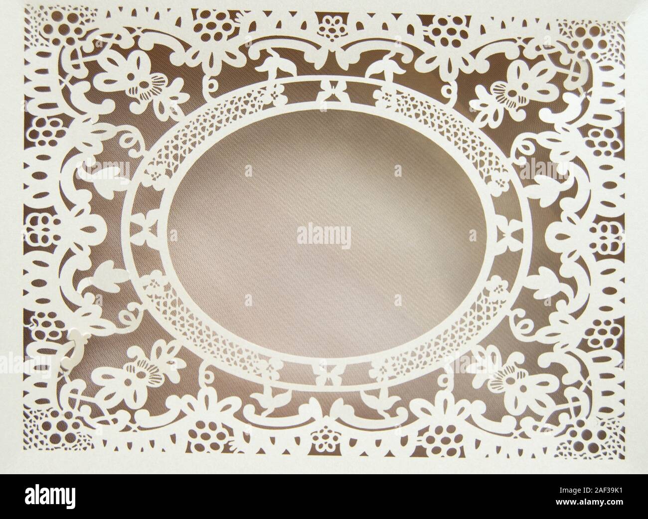 White paper hollow lace oval frame, done in the ornate and luxurious ...