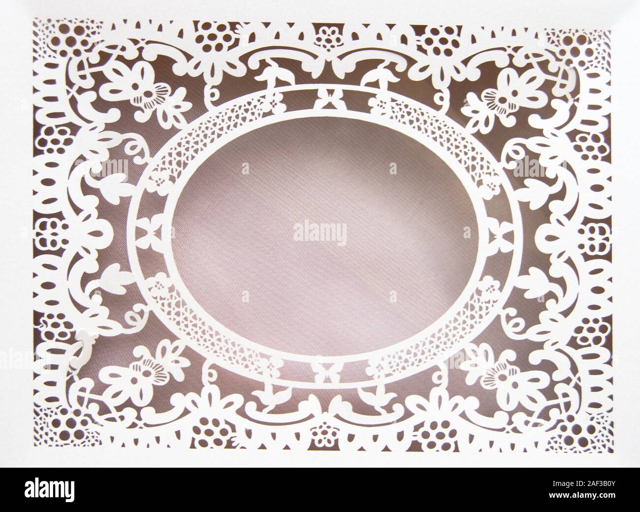 White paper hollow lace oval frame, done in the ornate and luxurious ...