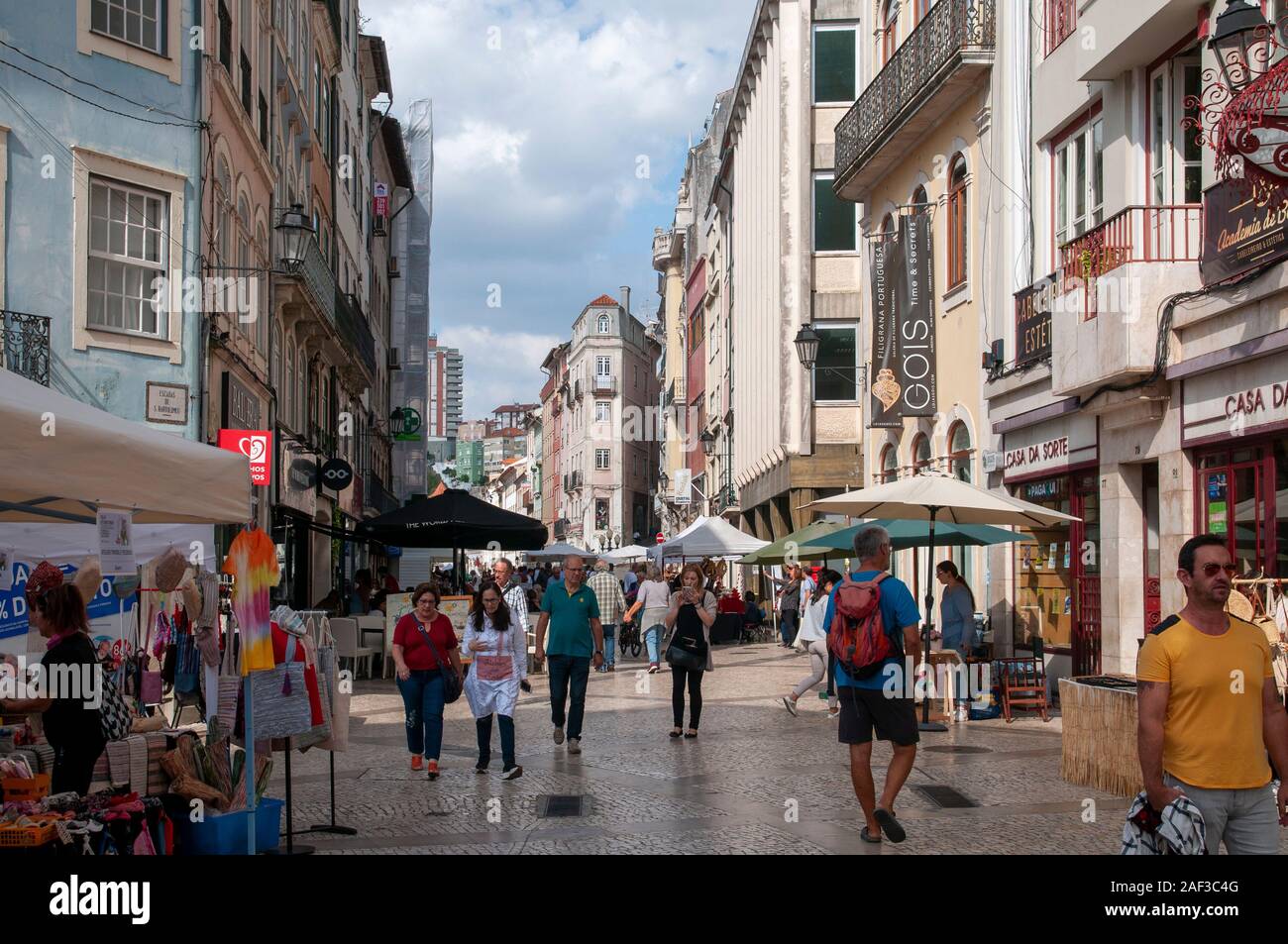 Pedestrian Street Of Rua Visconde Da Luz In Coimbra Portugal With An Arts And Crafts Fair Stock pedestrian-street-of-rua-visconde-da-luz-in-coimbra-portugal-with-an-arts-and-crafts-fair-stock
