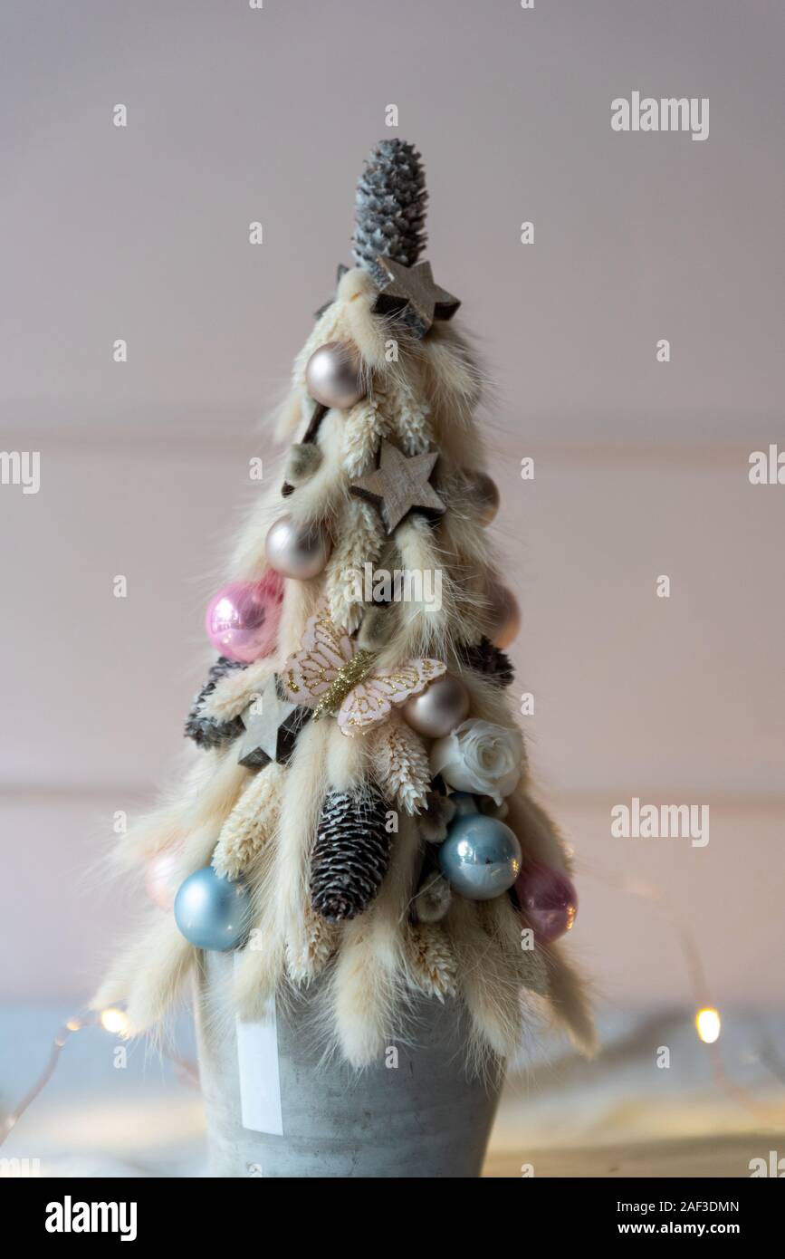 Little artificial christmas tree hi-res stock photography and images ...