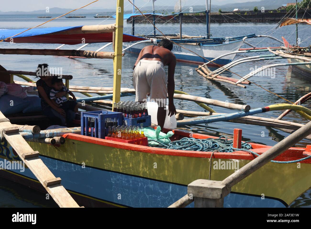 Ice blocks being transported for use of the artisanal Filipino tuna ...