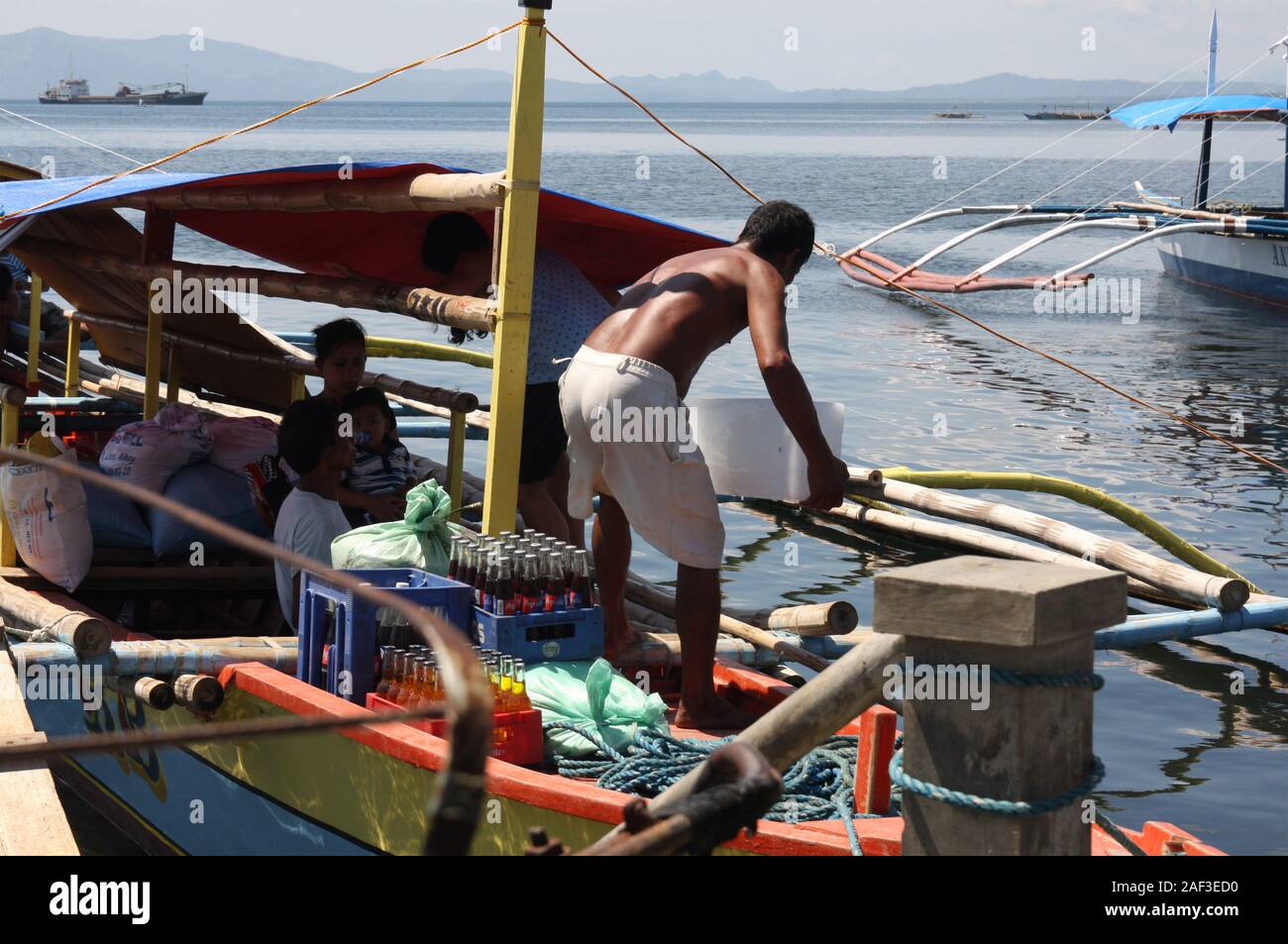 Ice blocks being transported for use of the artisanal Filipino tuna ...