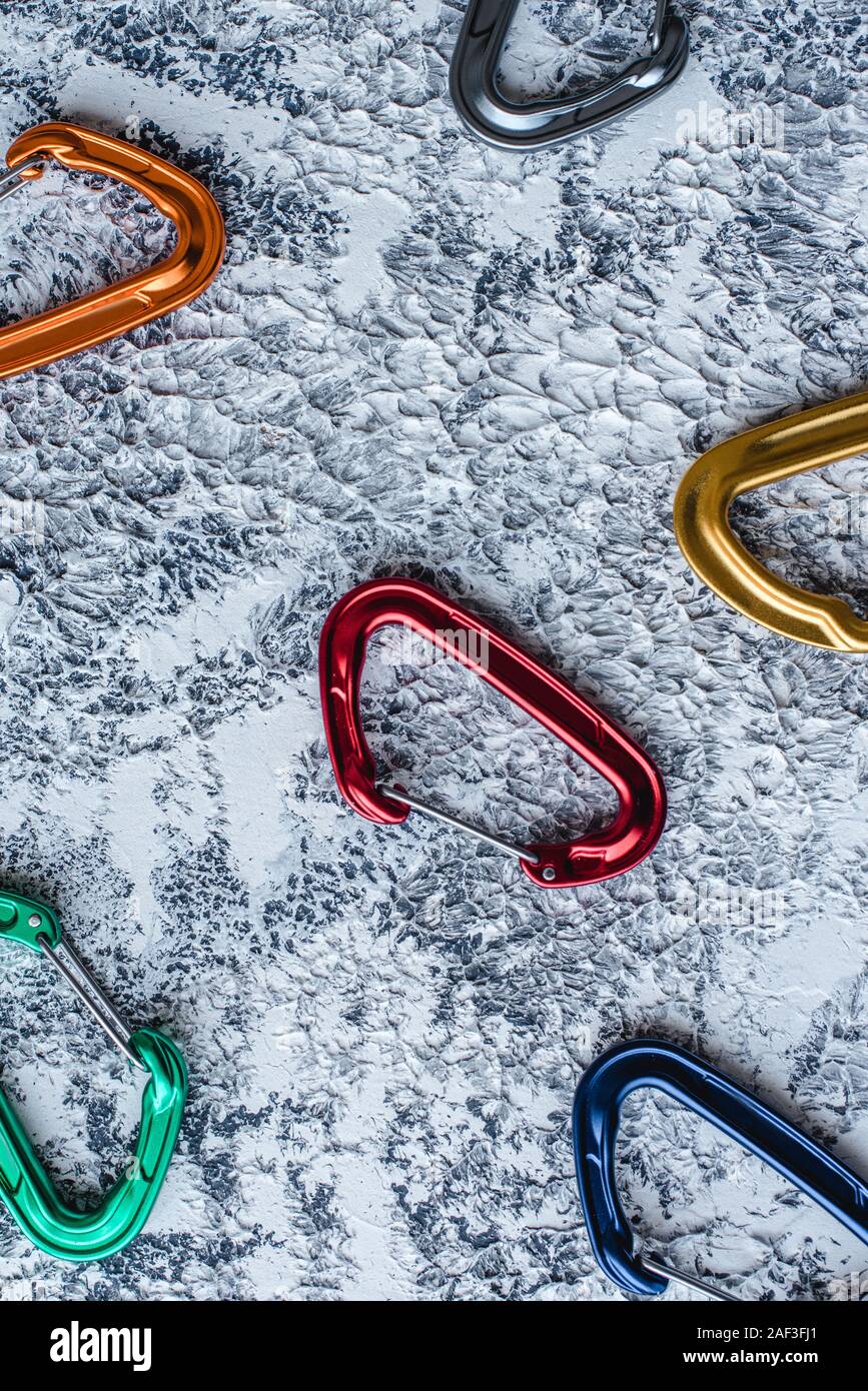 Nice colors. Isolated photo of climbing equipment. Part of carabiner ...