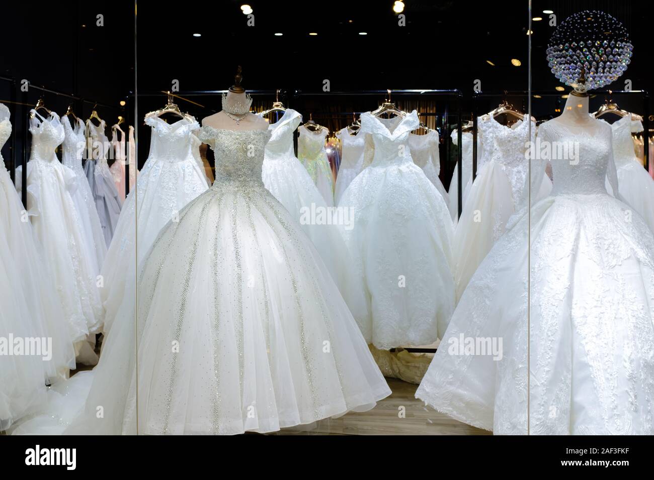 A lot of beautiful wedding dresses on display Stock Photo - Alamy