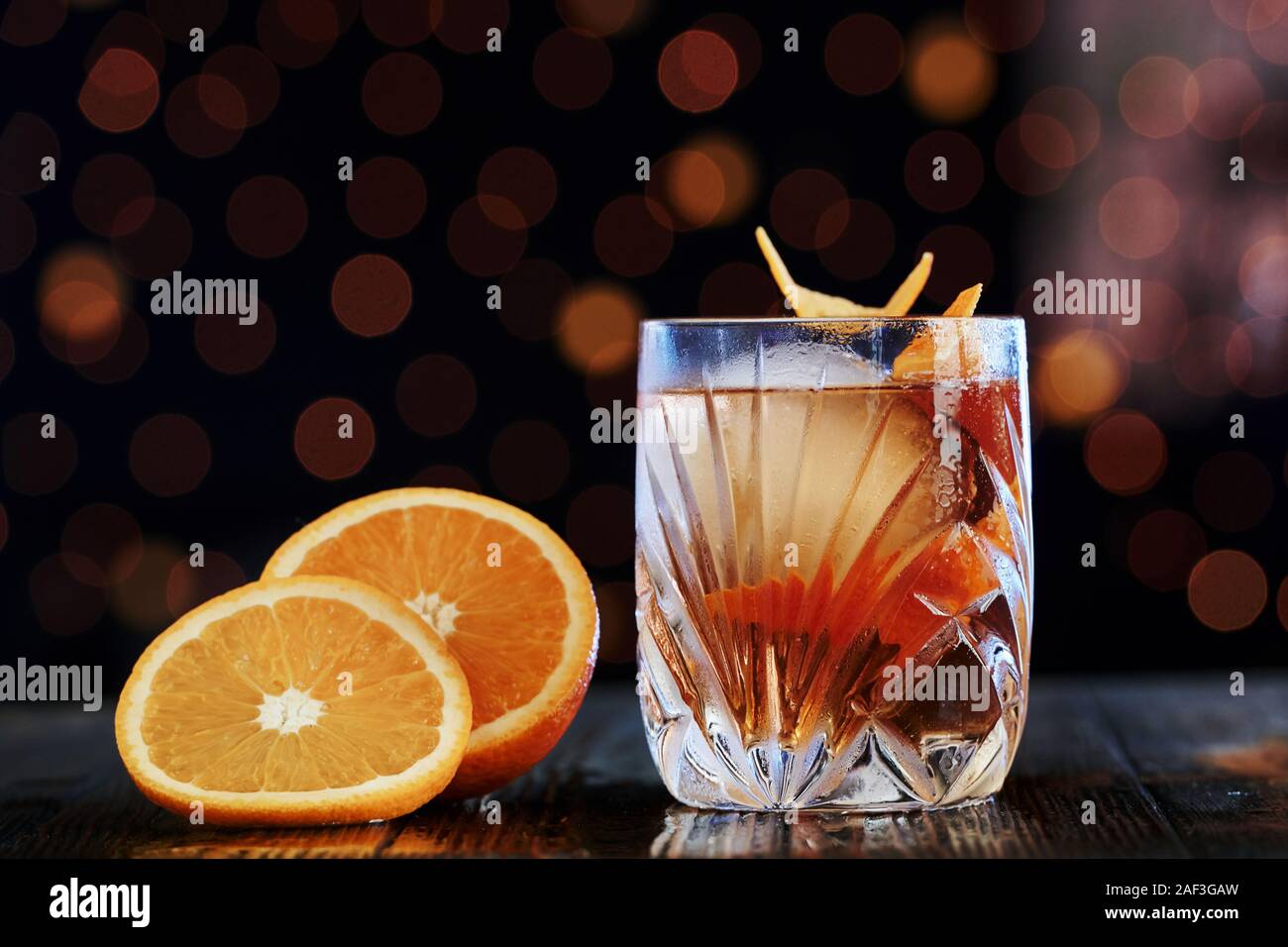Concept of drinks and luxury. Cocktail is ready. On the wooden table in ...