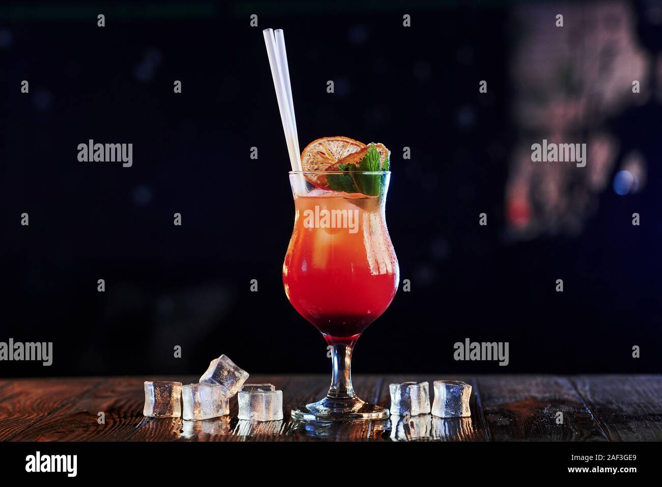 Traditional drink. On the wooden table in the night club. Nice lighting ...