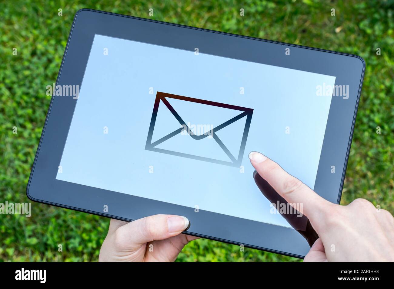 Mobile check the inbox Stock Photo - Alamy