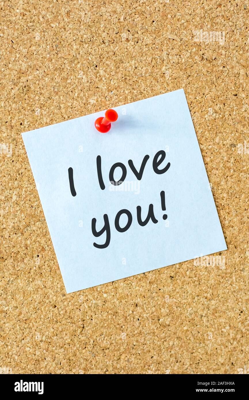 Love message on a piece of paper Stock Photo - Alamy